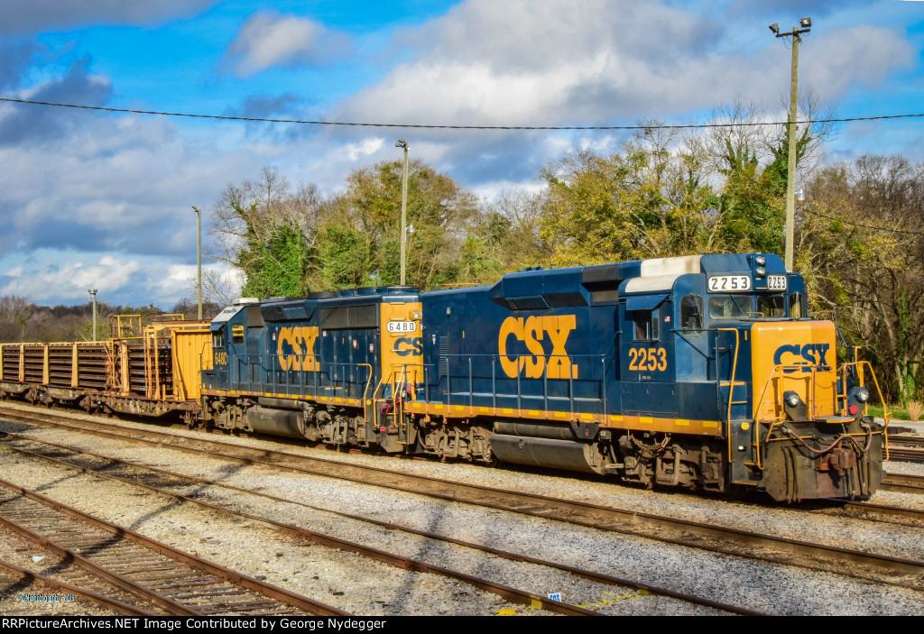 CSX 2253 & 6480 sitting @ the yard with a welded rail train